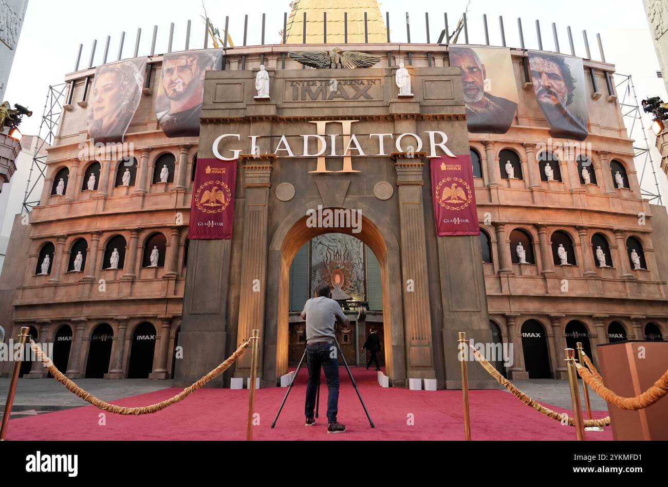 A photographer lines up a picture of the TCL Chinese Theatre, designed ...