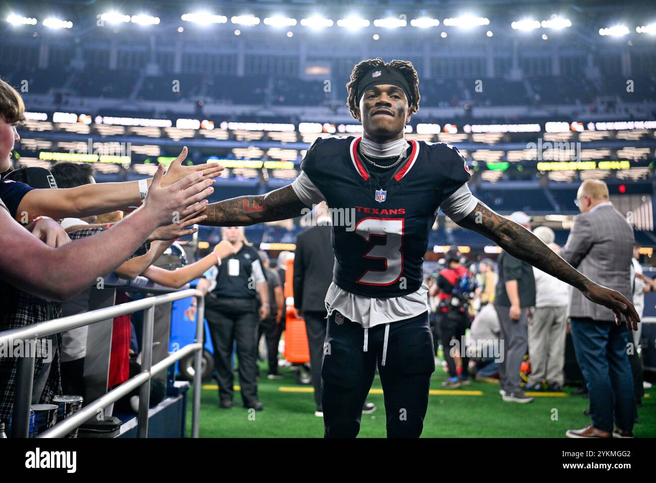 Houston Texans wide receiver Tank Dell leaves the field following an ...