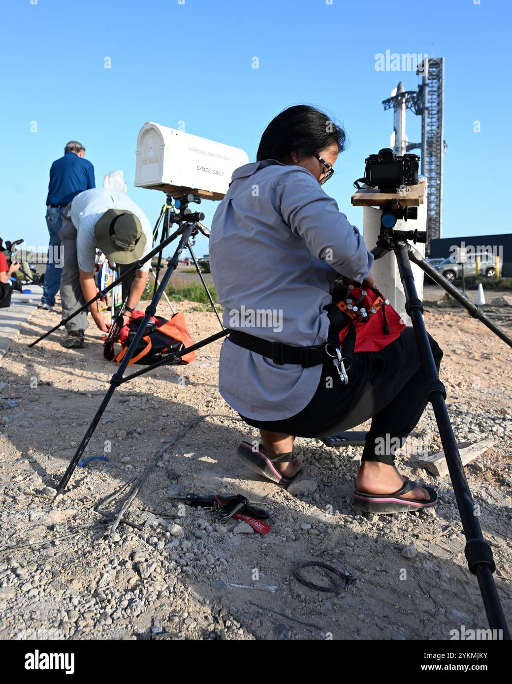 Social and Media photographers work on setting remote cameras to ...