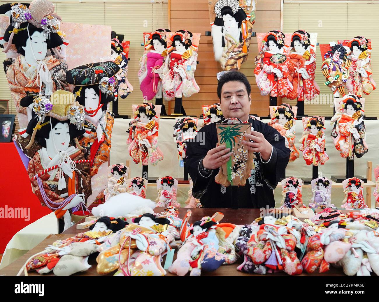 Japanese traditional craft "Kasukabe Oshie Hagoita" are made at a ...