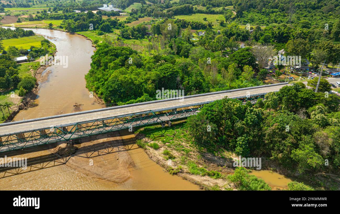 Aerial view of The historic Tha Pai Bridge, spanning the Pai River, is ...