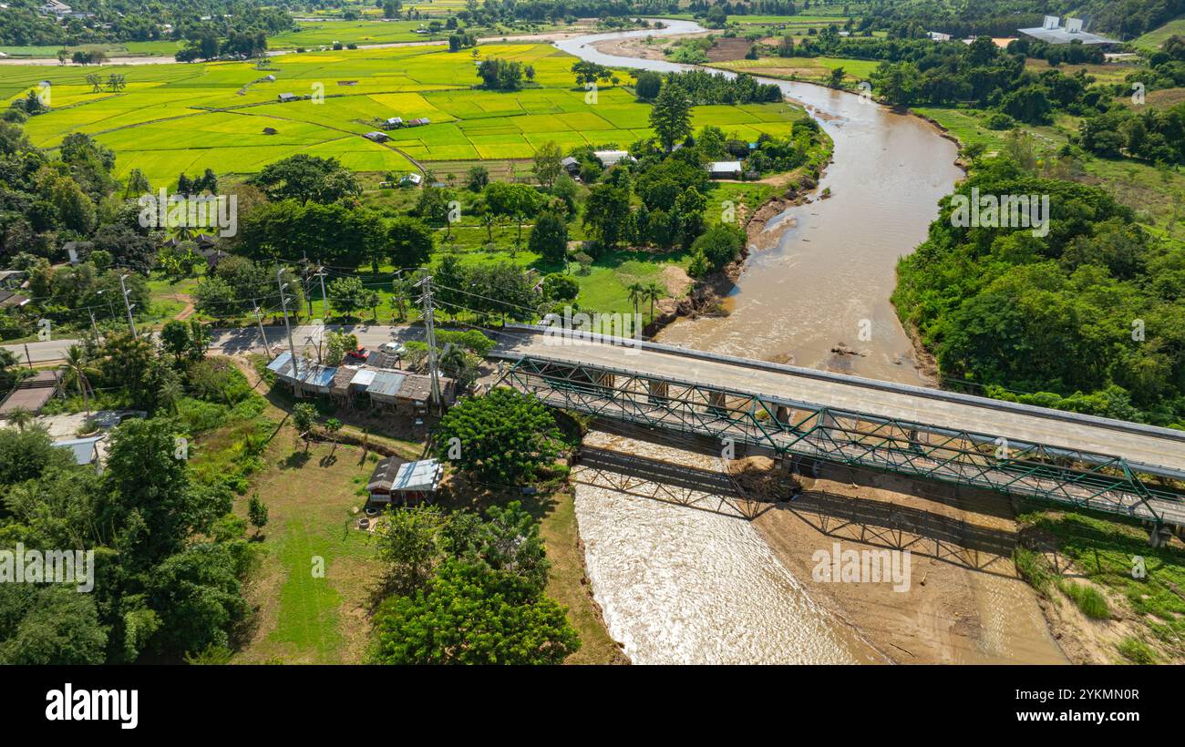 Aerial view of The historic Tha Pai Bridge, spanning the Pai River, is ...