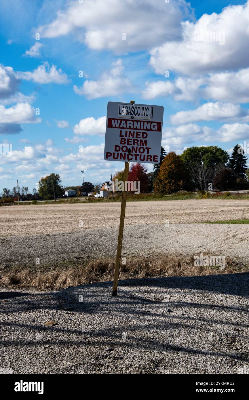 Lagasco Inc. warning sign lined berm in Wheatley, Ontario, Canada Stock ...