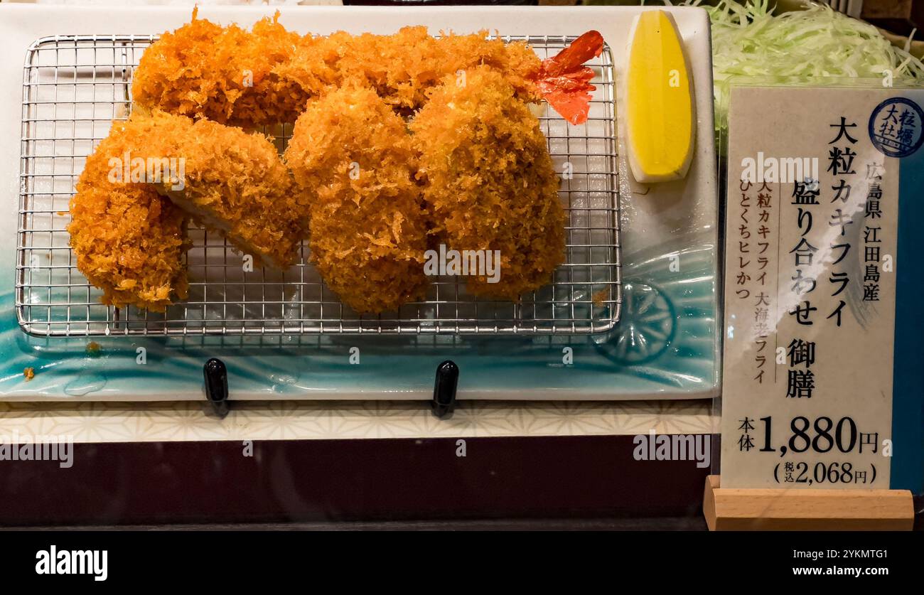 Traditional japanese breaded pork cutlet, tonkatsu, with cabbage and ...