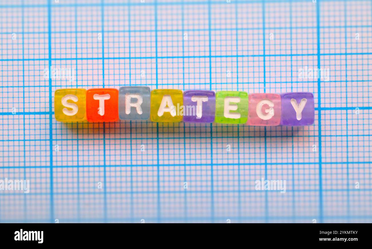 colorful blocks with "Strategy" text on lined paper background Stock ...