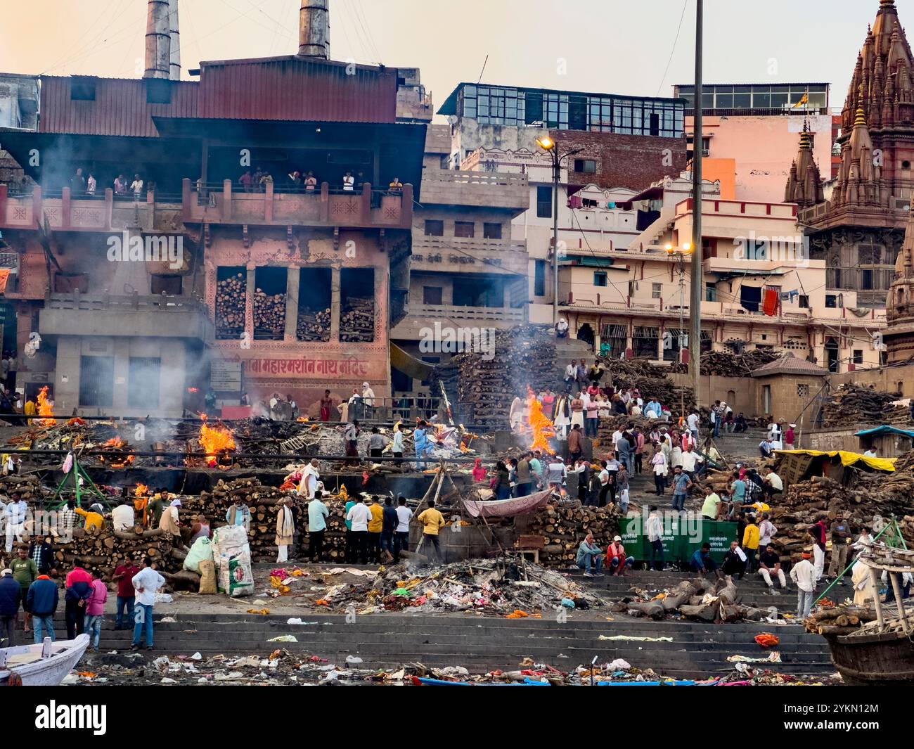 Crowds gather around traditional funeral pyres at the sacred ...