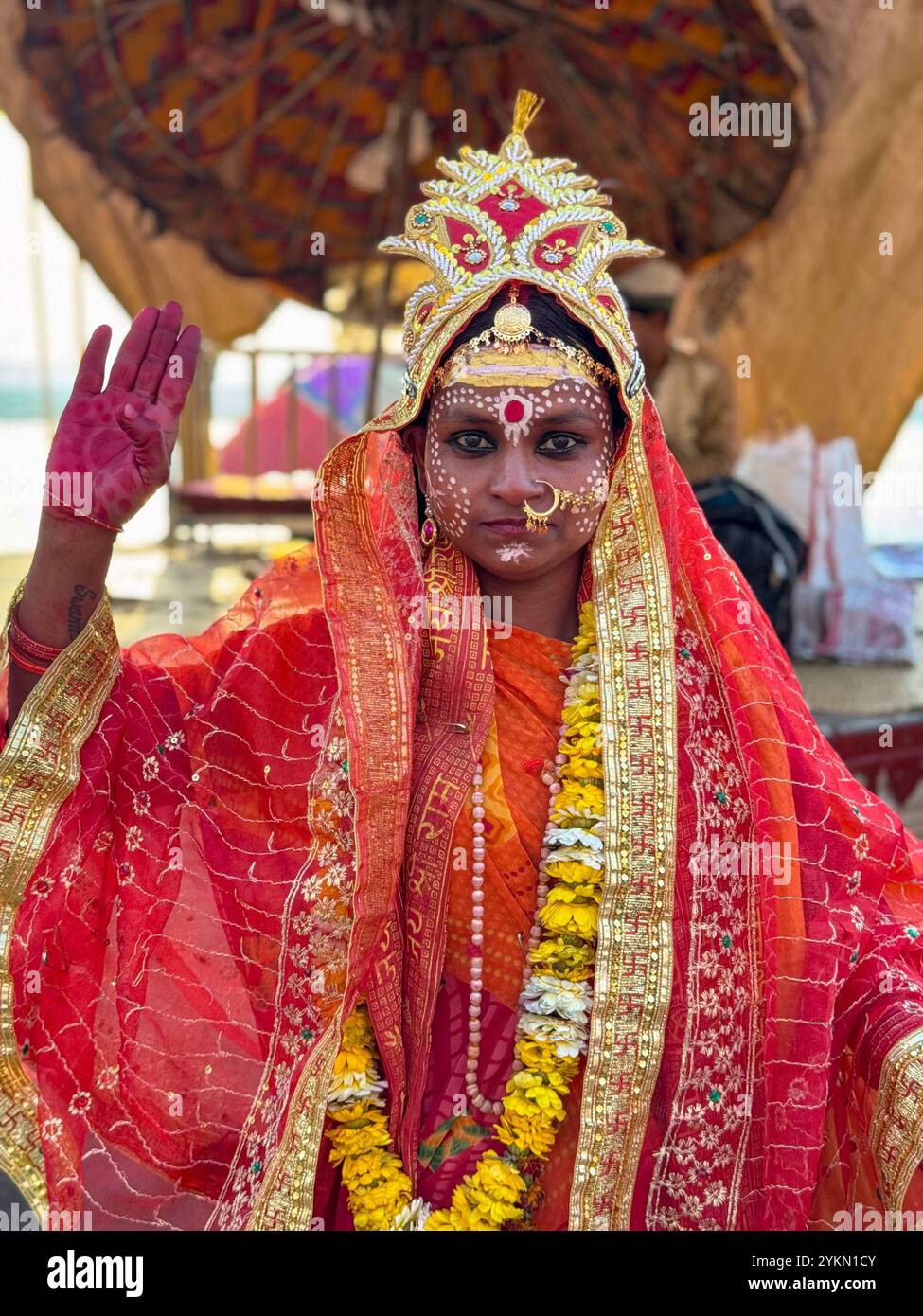 Stunning indian bride dressed in a red bridal saree with exquisite ...