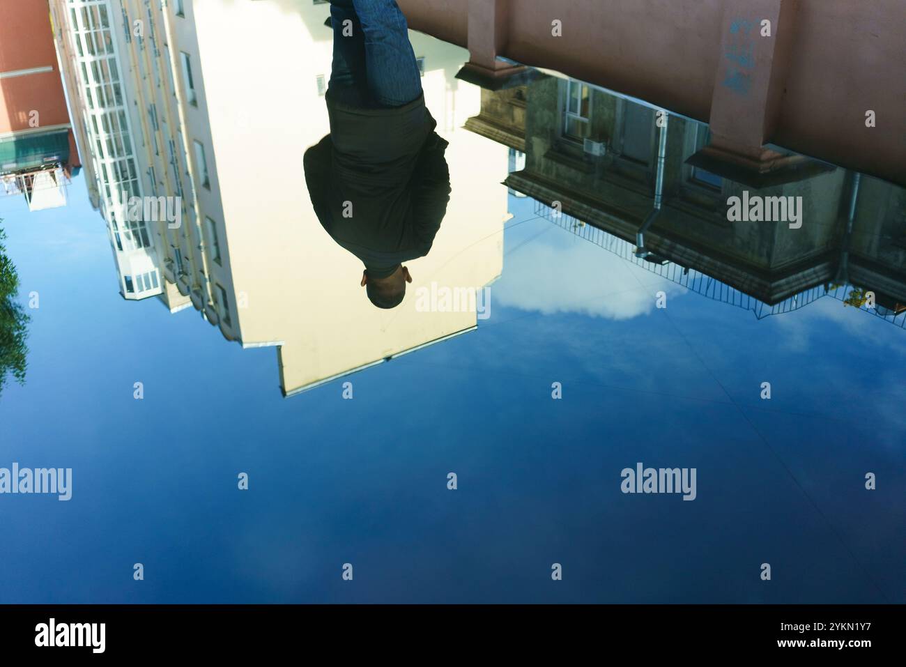 Silhouette man walking reflected hi-res stock photography and images ...
