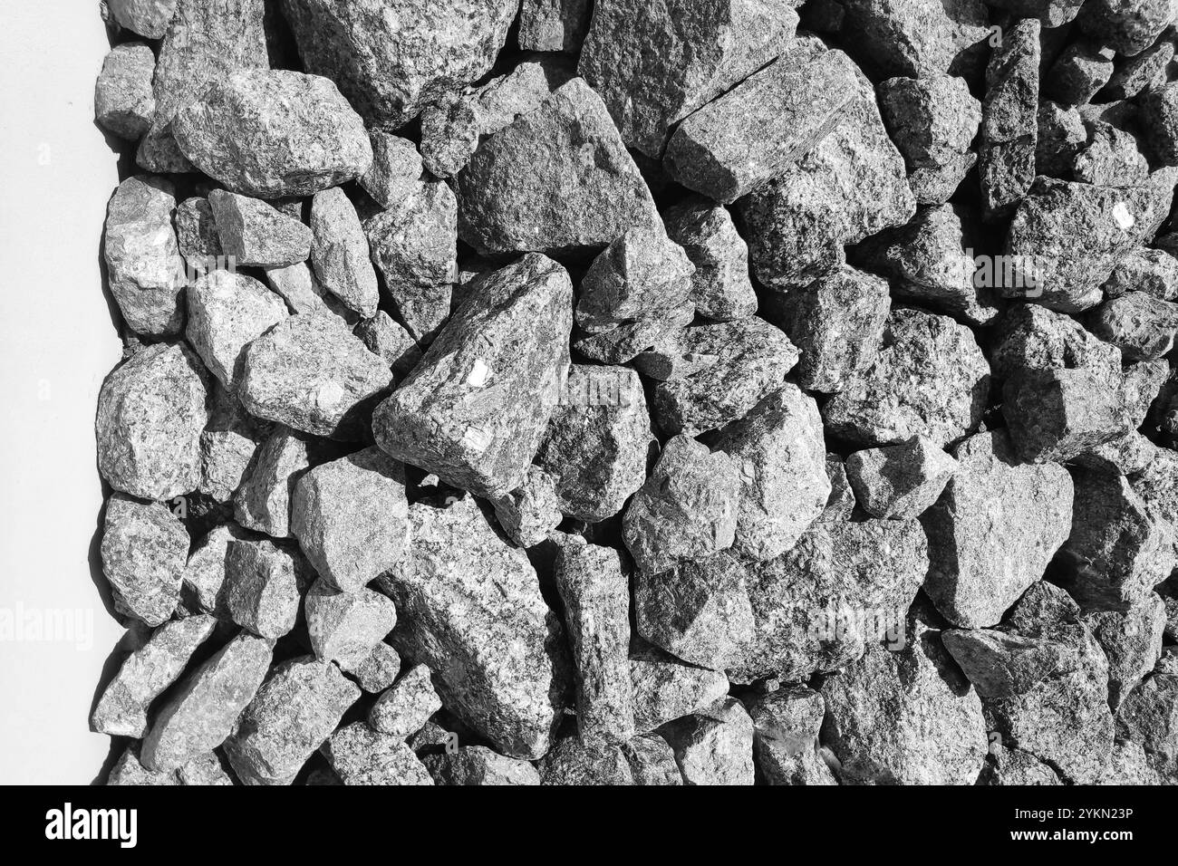 Pile of rocks with a gray color. The rocks are scattered and piled up ...