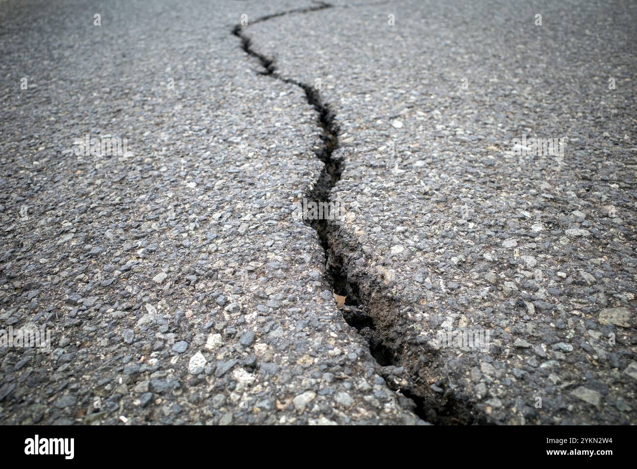 Asphalt cracks, road surface damage due to earthquake in Indonesia ...