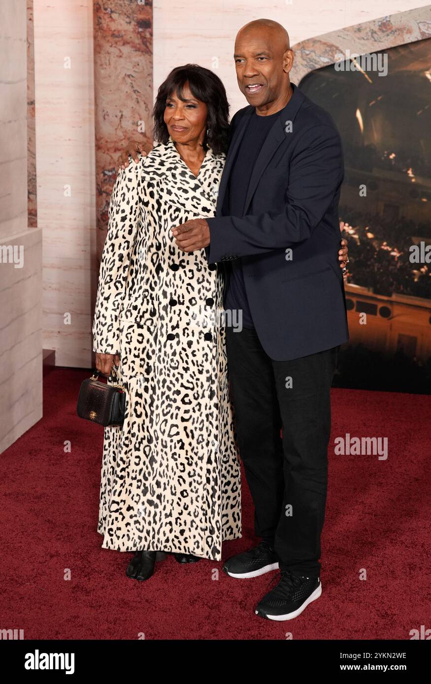 Denzel Washington, right, and his wife Paulette pose together at the ...