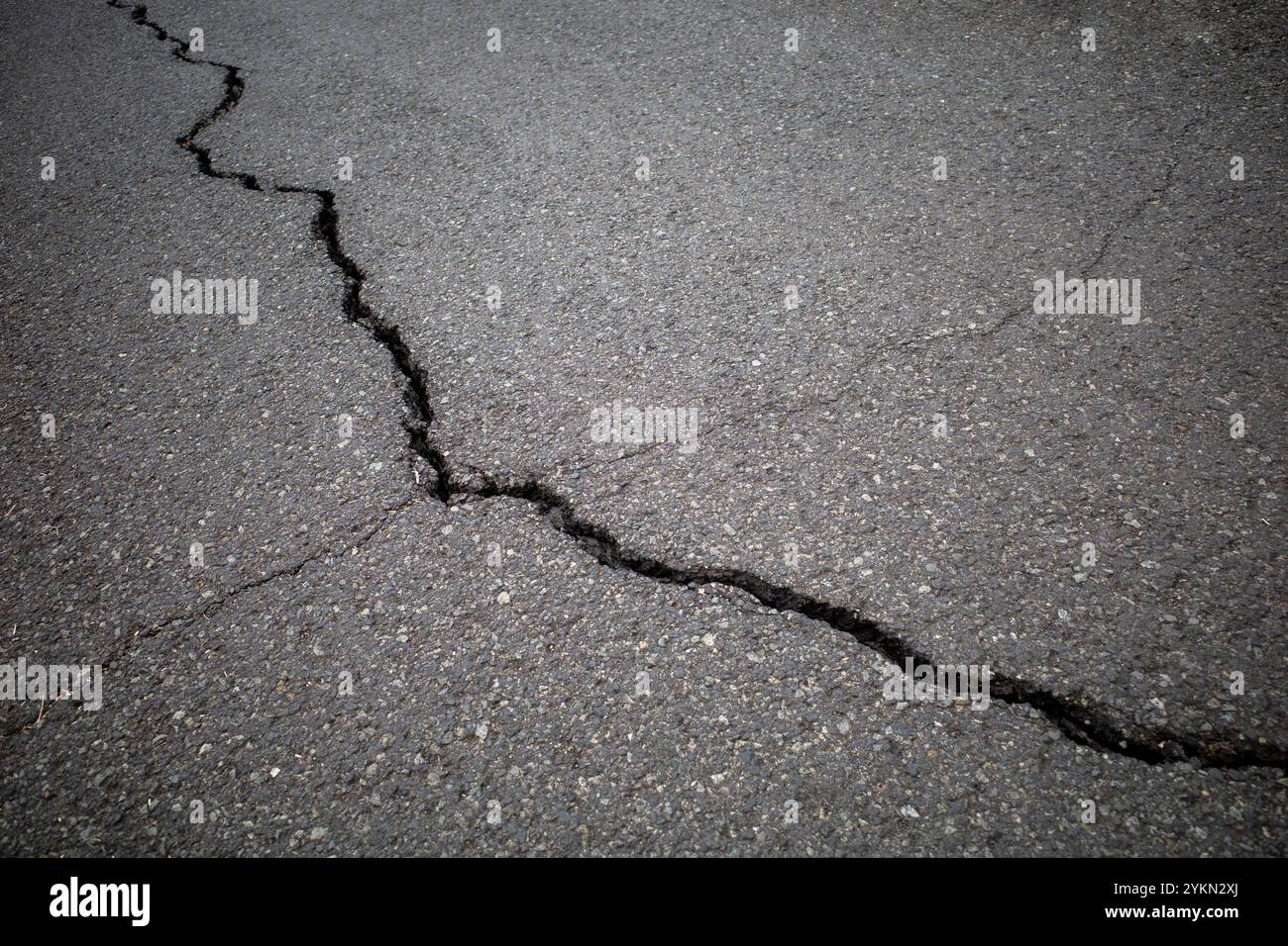 Asphalt cracks, road surface damage due to earthquake in Indonesia ...