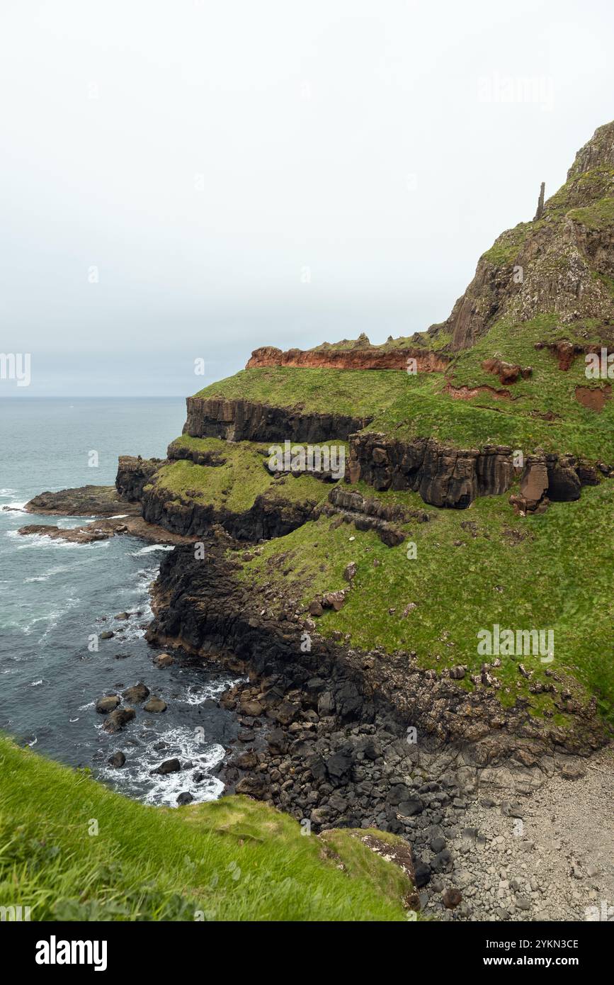 Rugged coastal landscape at Giant's Causeway captured in a vertical ...