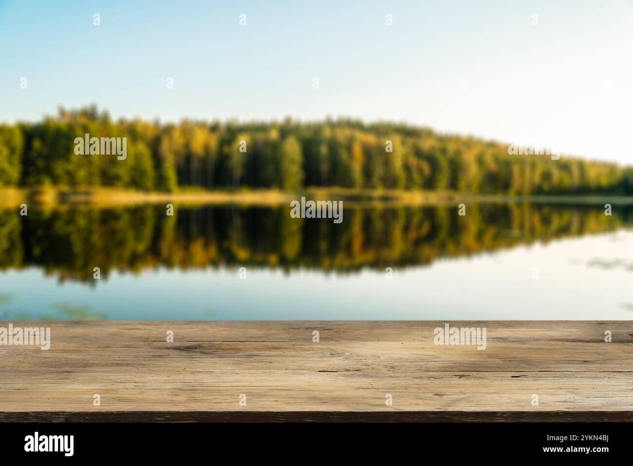 Wooden table with forest lake and nature background. Product display ...