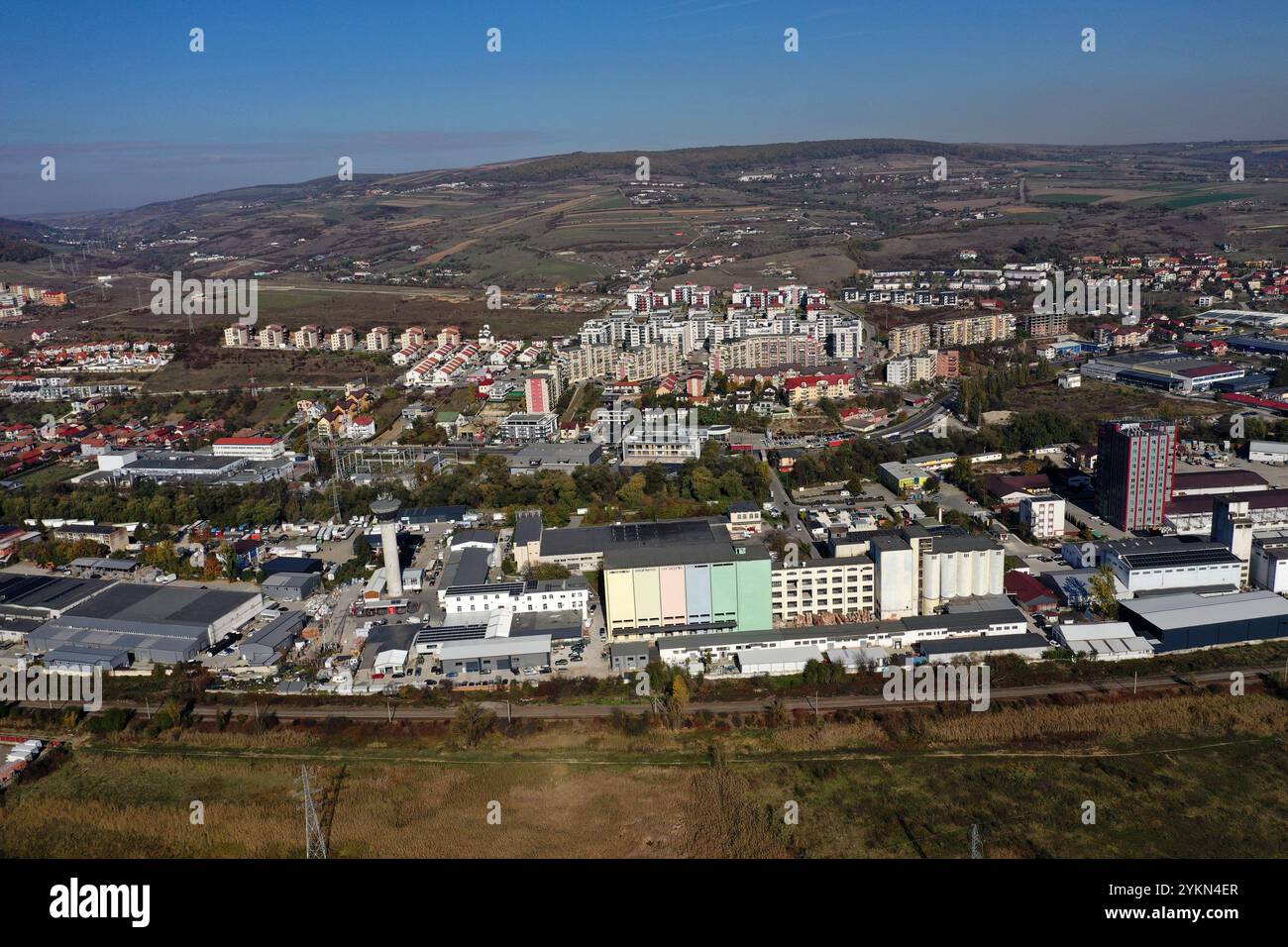 Factories in suburban industrial area aerial view by drone Stock Photo ...
