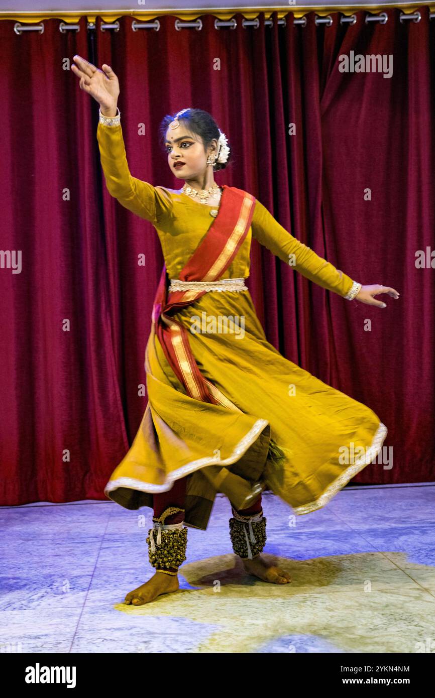 Skilled dancer in vibrant attire showcasing a graceful indian classical ...
