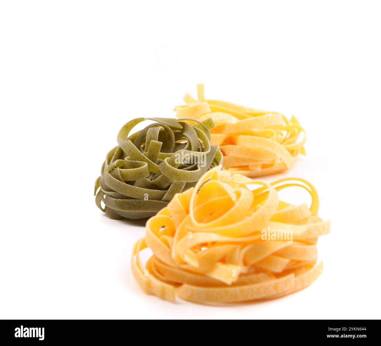 Tagliatelle paglia e fieno homemade tipycal italian pasta close-up on ...