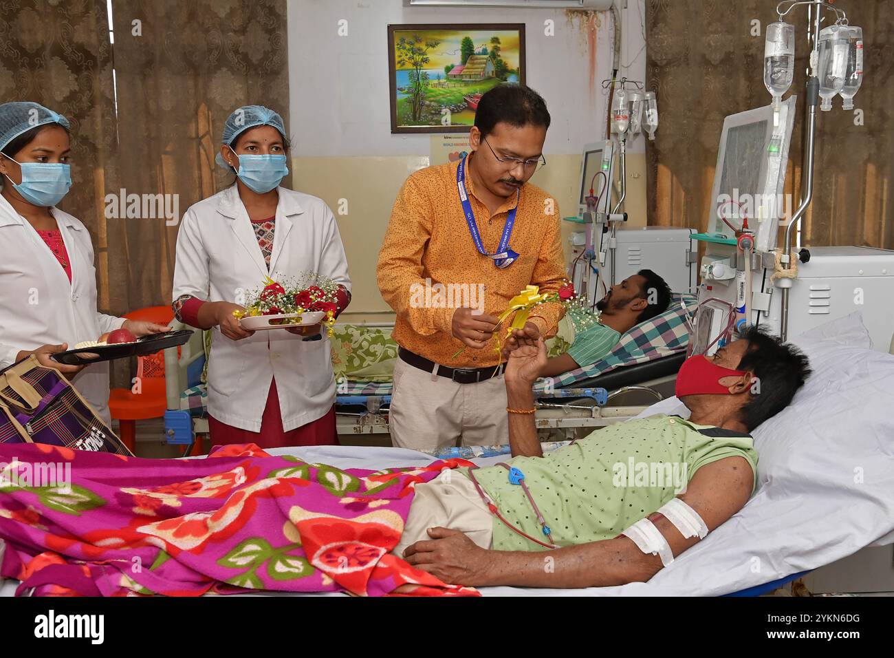 Doctors, along with health workers, distribute roses and fruits during ...