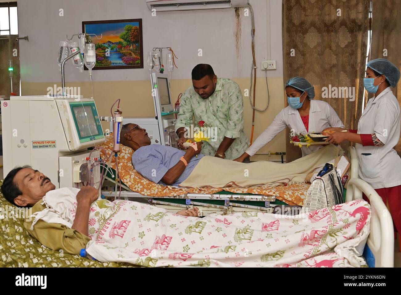 Doctors, along with health workers, distribute roses and fruits during ...