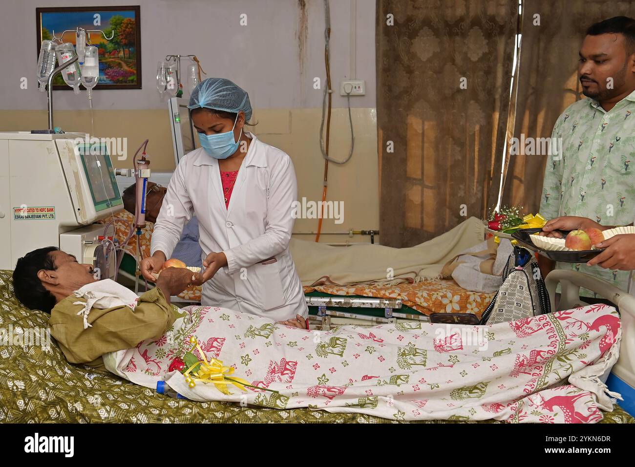 Doctors, along with health workers, distribute roses and fruits during ...
