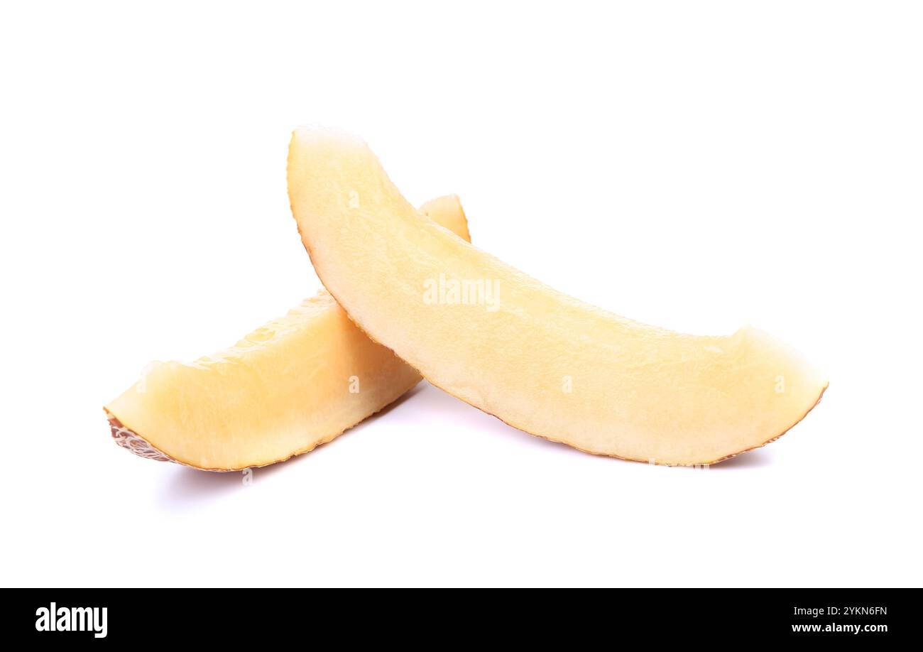 Two melon slices close up on a white background Stock Photo - Alamy