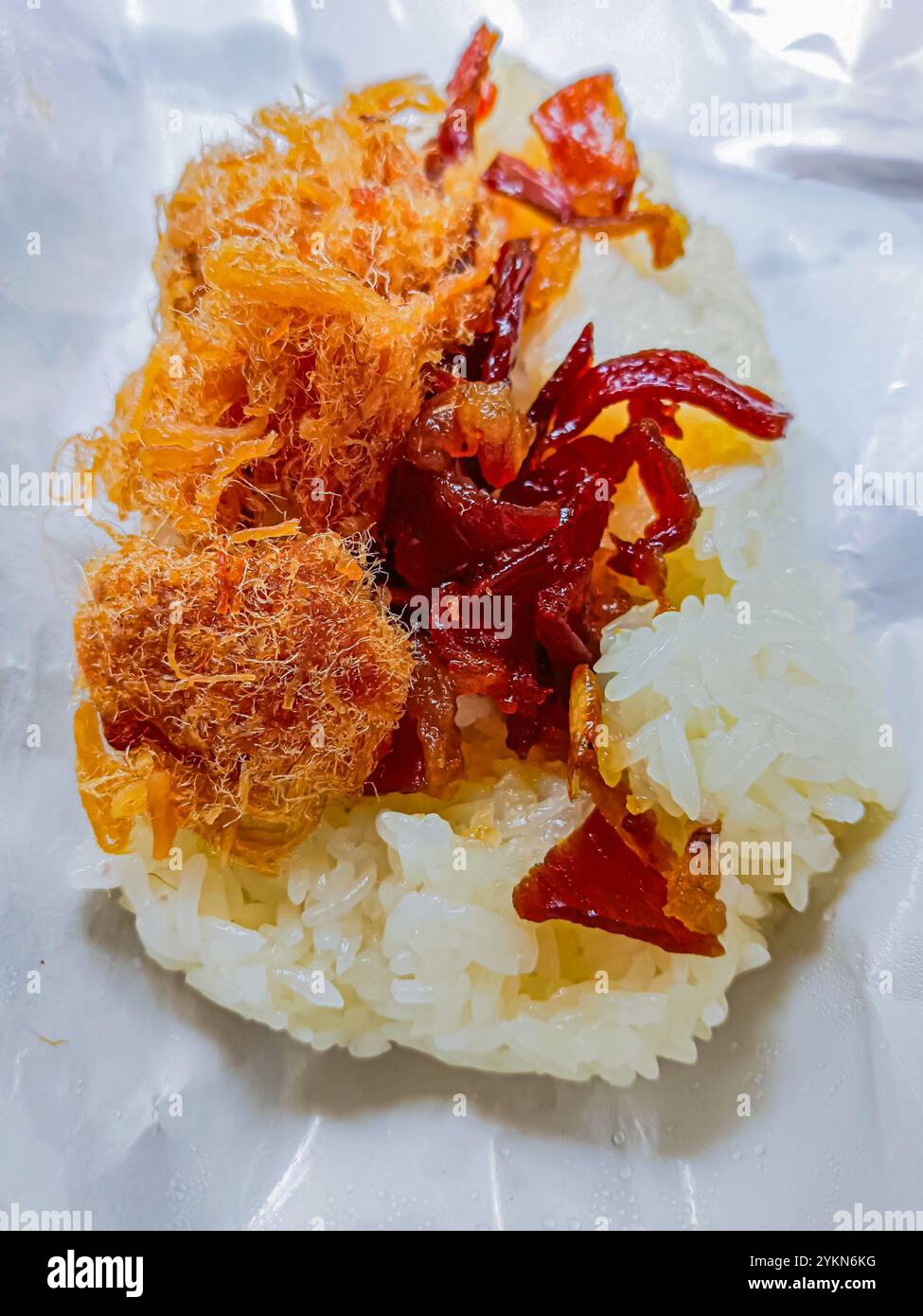 Thai food is "khao niew moo tod", Sticky rice and deep fried pork food ...