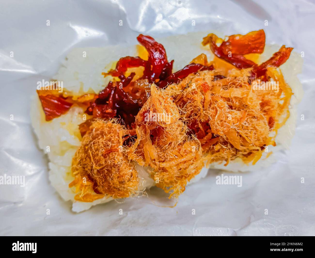 Thai food is "khao niew moo tod", Sticky rice and deep fried pork food ...