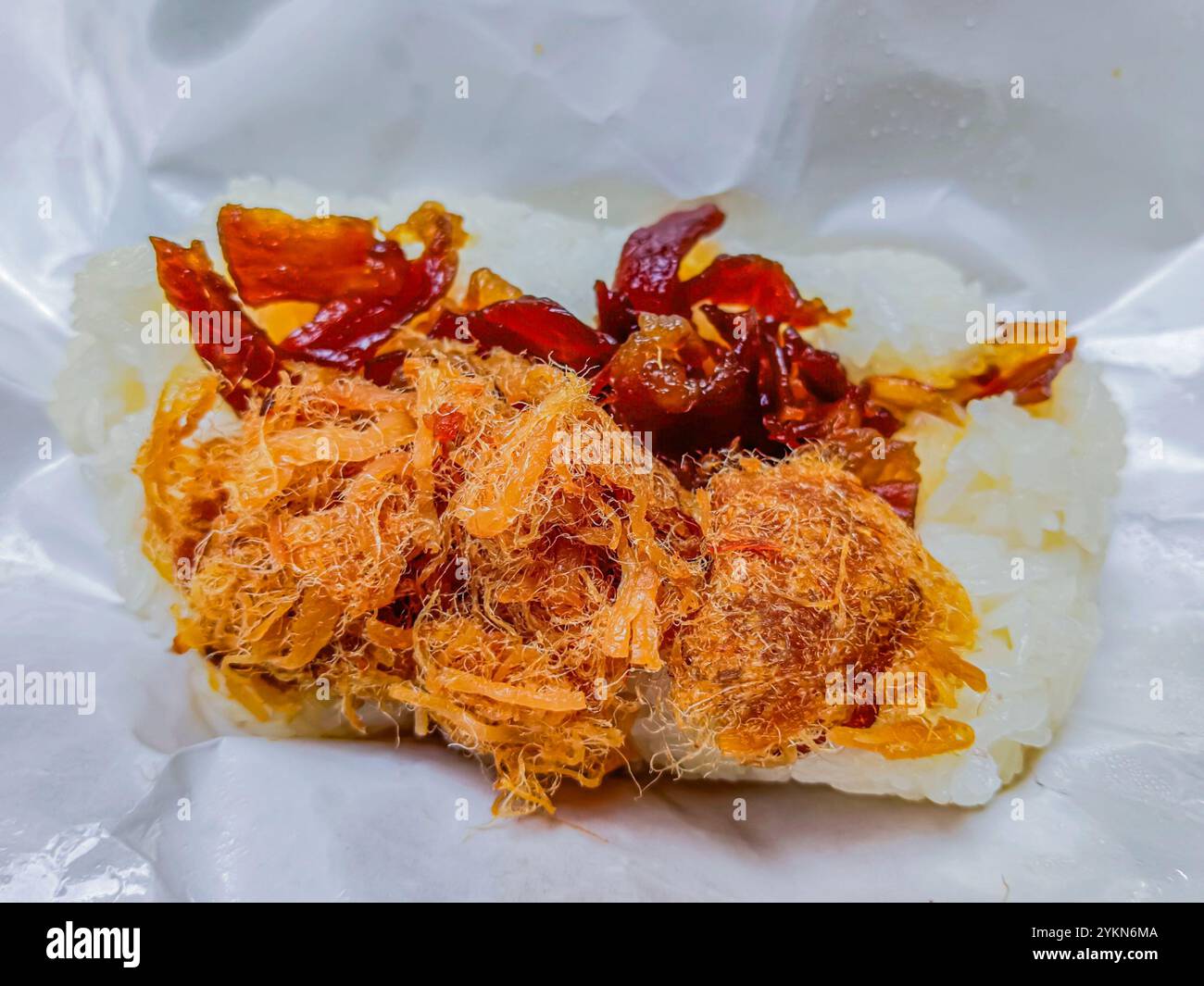 Thai food is "khao niew moo tod", Sticky rice and deep fried pork food ...