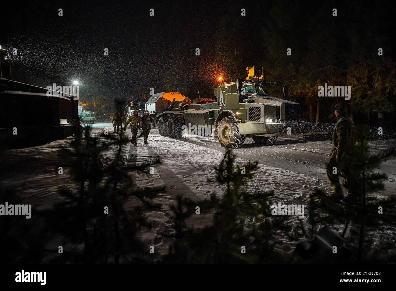 British Army soldiers move out vehicles as they take part in training ...