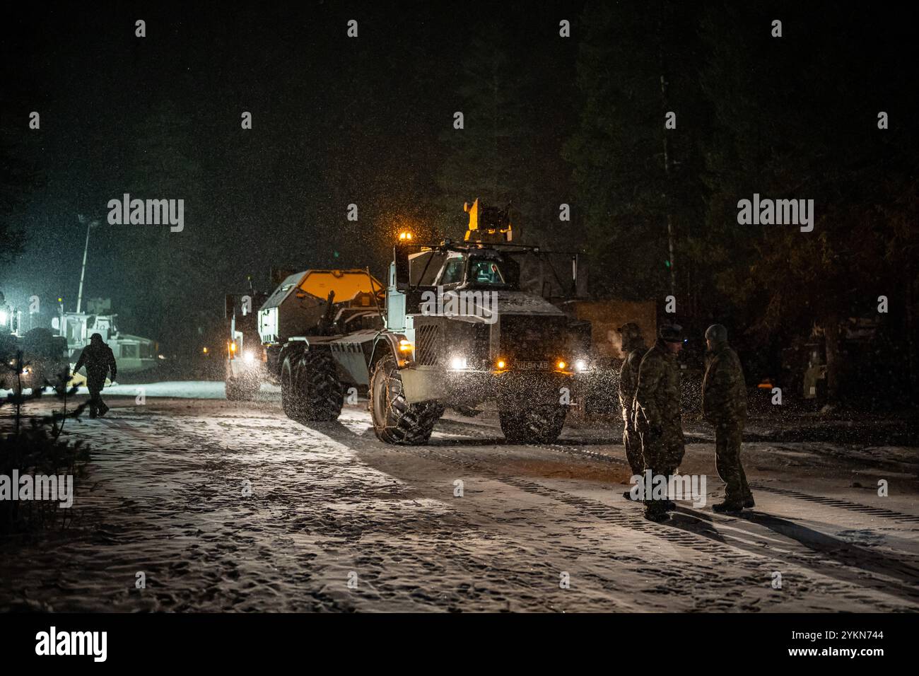 British Army soldiers move out vehicles as they take part in training ...
