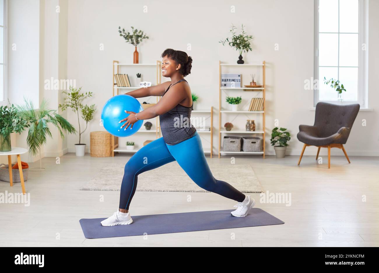 African american exercising fitball hi-res stock photography and images ...