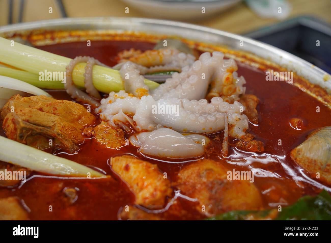 Spicy Korean stew with chicken and octopus Stock Photo - Alamy