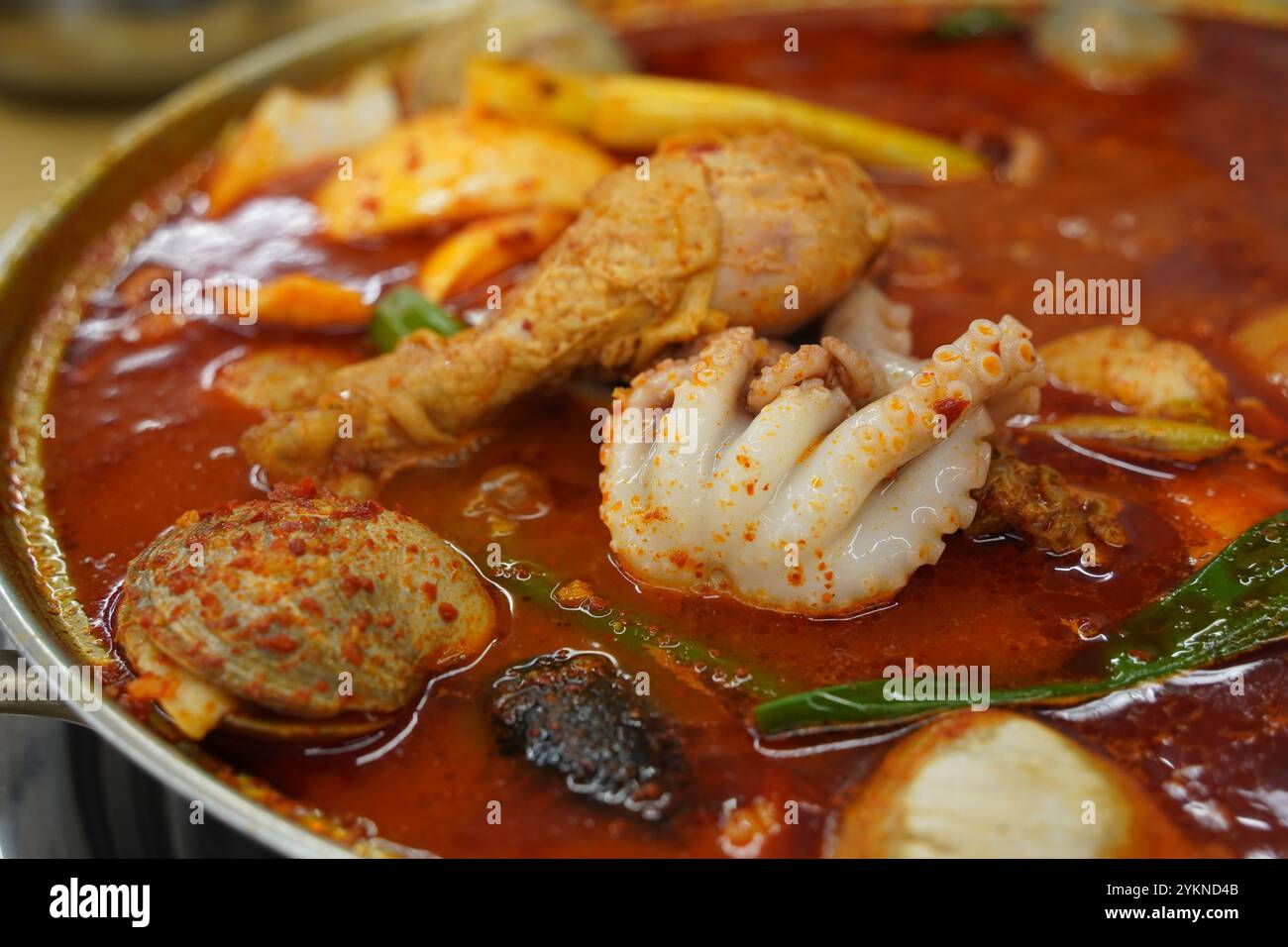 Spicy Korean stew with chicken and octopus Stock Photo - Alamy