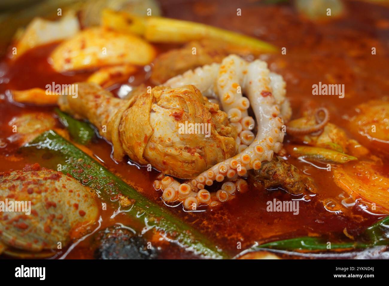 Spicy Korean stew with chicken and octopus Stock Photo - Alamy