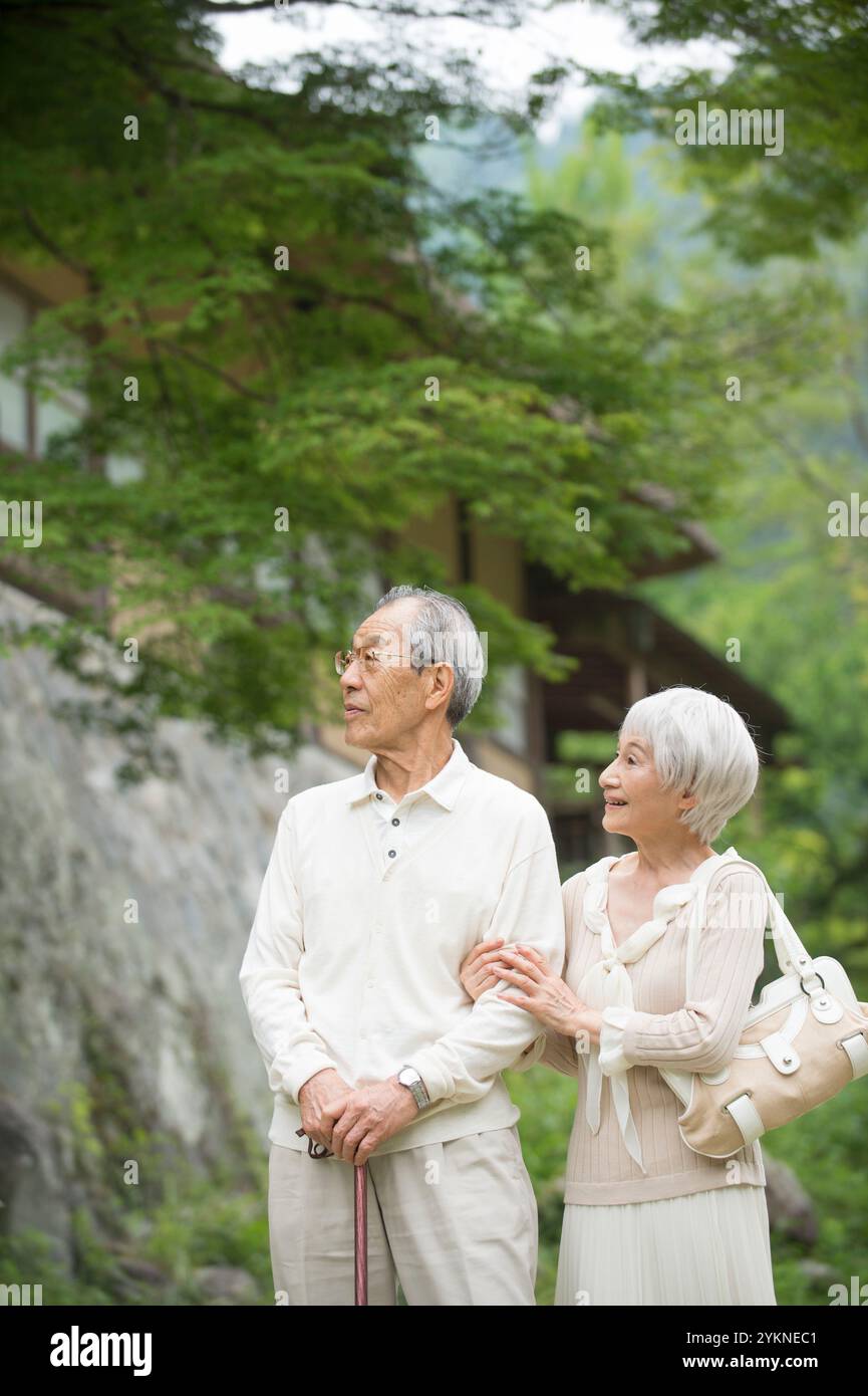 Senior couple bathing in forest Stock Photo - Alamy