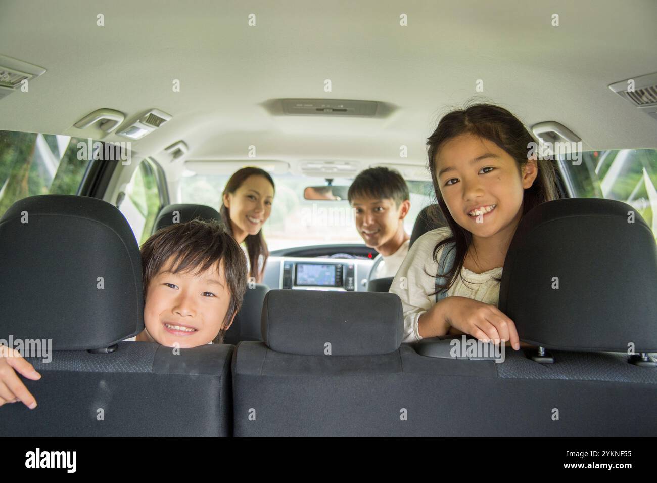 Family in car Stock Photo - Alamy