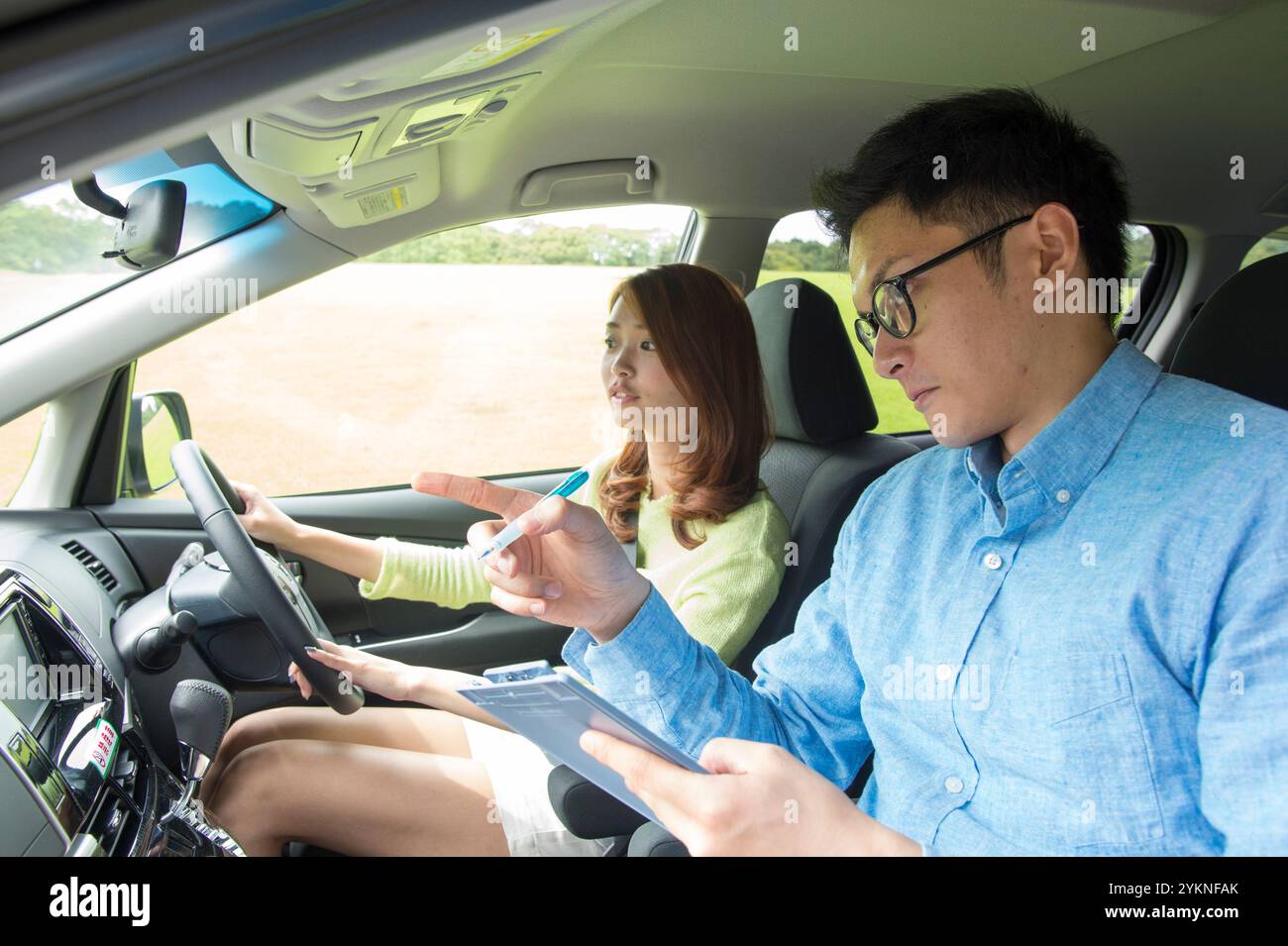 Two women driving instructor hi-res stock photography and images - Alamy