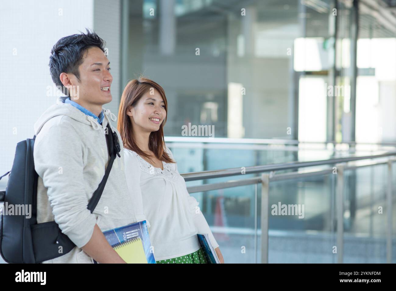 University student couple in school building Stock Photo - Alamy