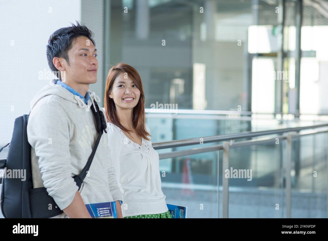 University student couple in school building Stock Photo - Alamy