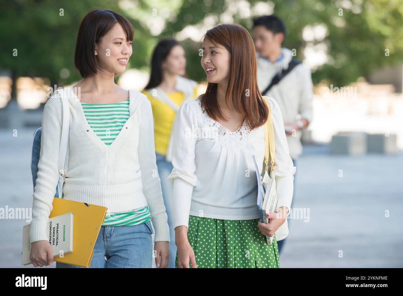 College student walking bag hi-res stock photography and images - Alamy