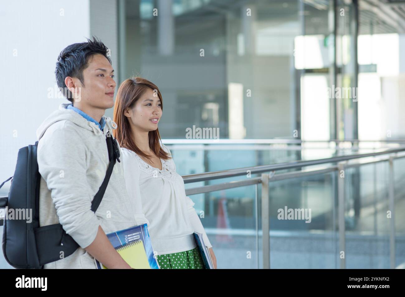 University student couple in school building Stock Photo - Alamy
