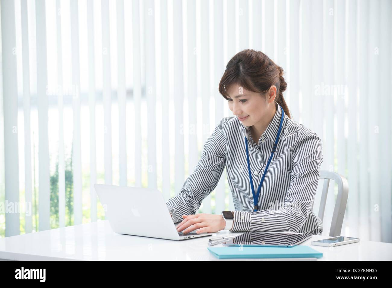 Office worker at PC desk Stock Photo - Alamy