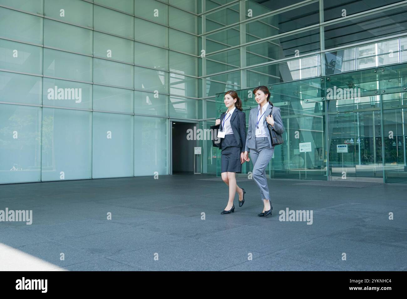Walking into office building hi-res stock photography and images - Alamy