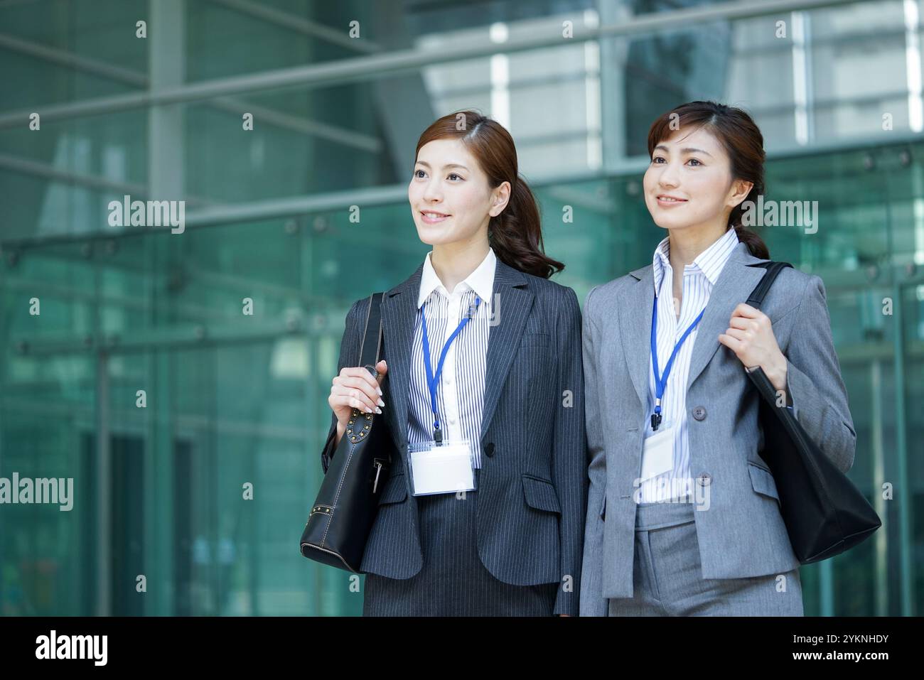 Young happy woman walking through hi-res stock photography and images ...