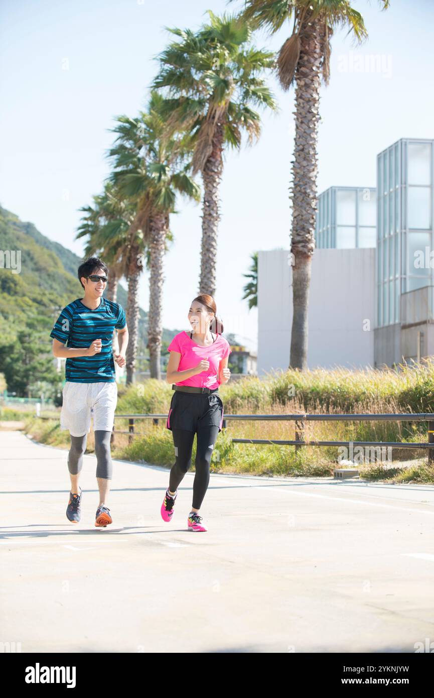 Couple of palm trees hi-res stock photography and images - Alamy