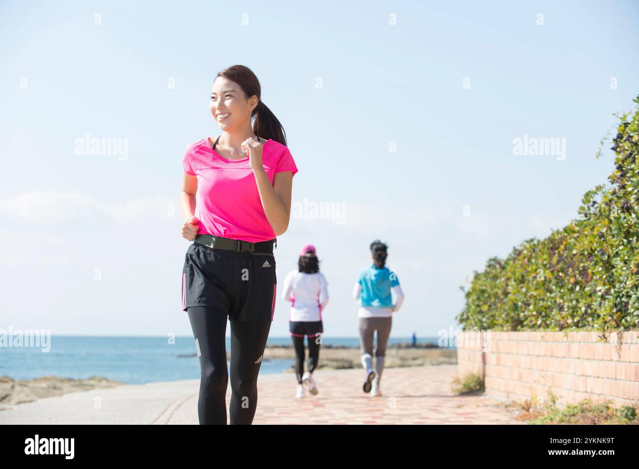 Three people running on hi-res stock photography and images - Alamy
