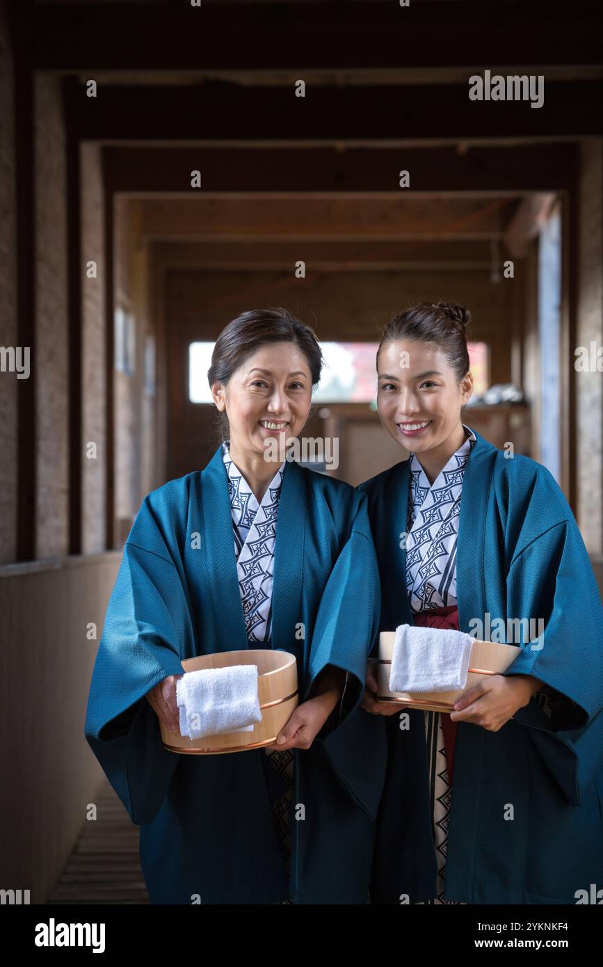Mother and daughter in yukata and haori at a hot spring Stock Photo - Alamy