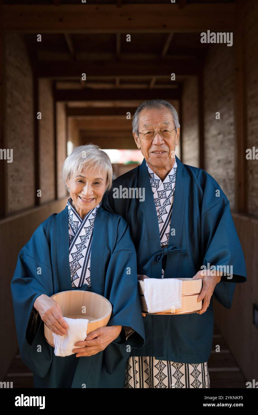 Senior couple in yukata and haori at the hot spring Stock Photo - Alamy