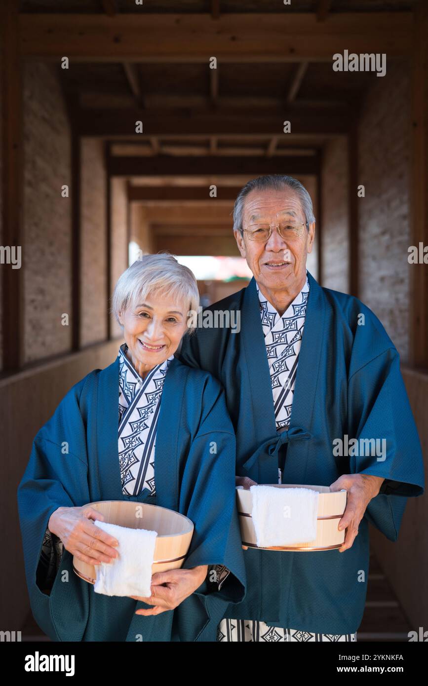 Senior couple in yukata and haori at the hot spring Stock Photo - Alamy