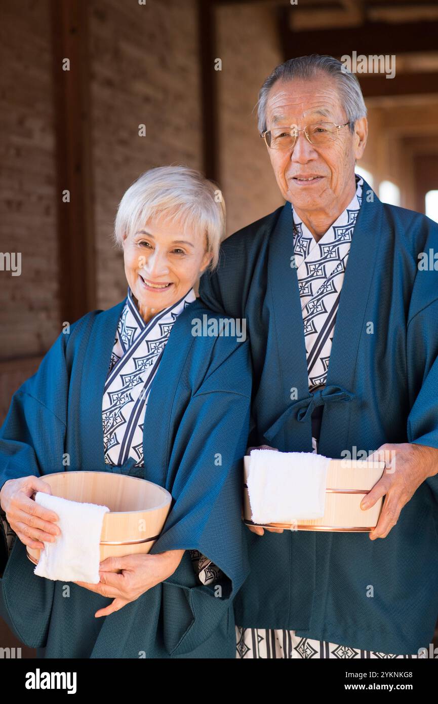 Senior couple in yukata and haori at the hot spring Stock Photo - Alamy